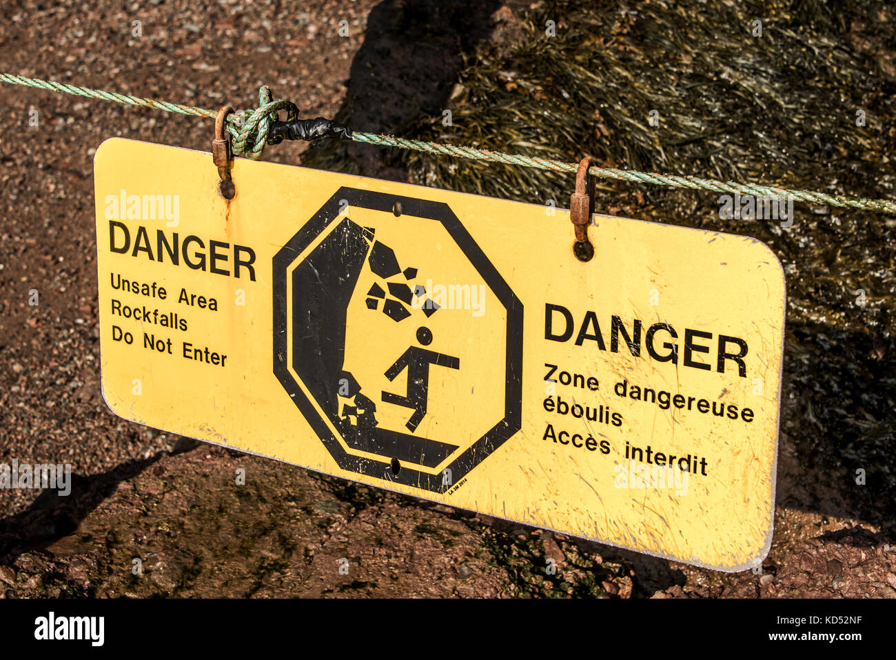 Danger Sign The famous Hopewell Rocks geologigal formations at low tide ...