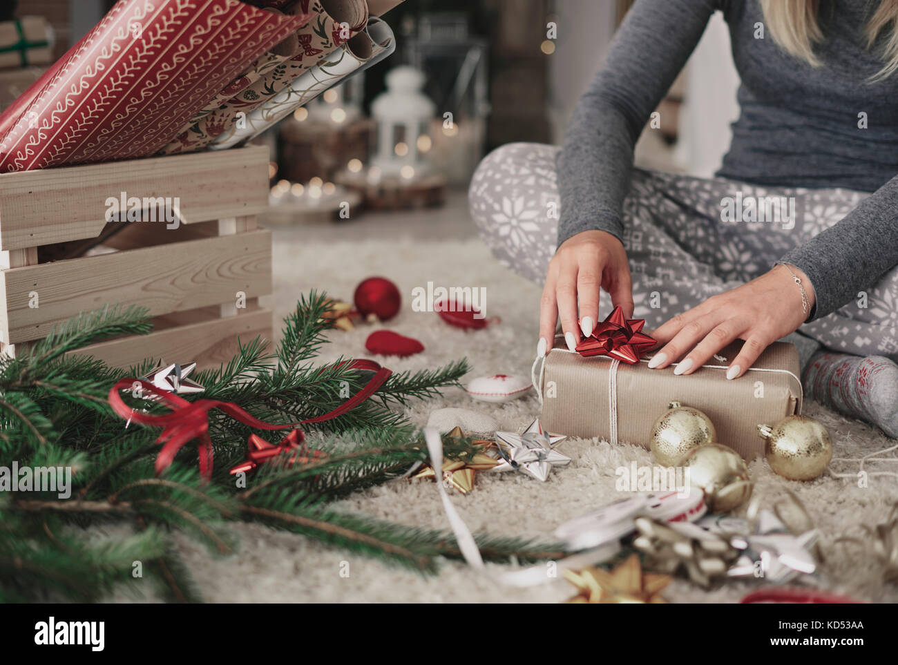Person wrapping present hi-res stock photography and images - Alamy
