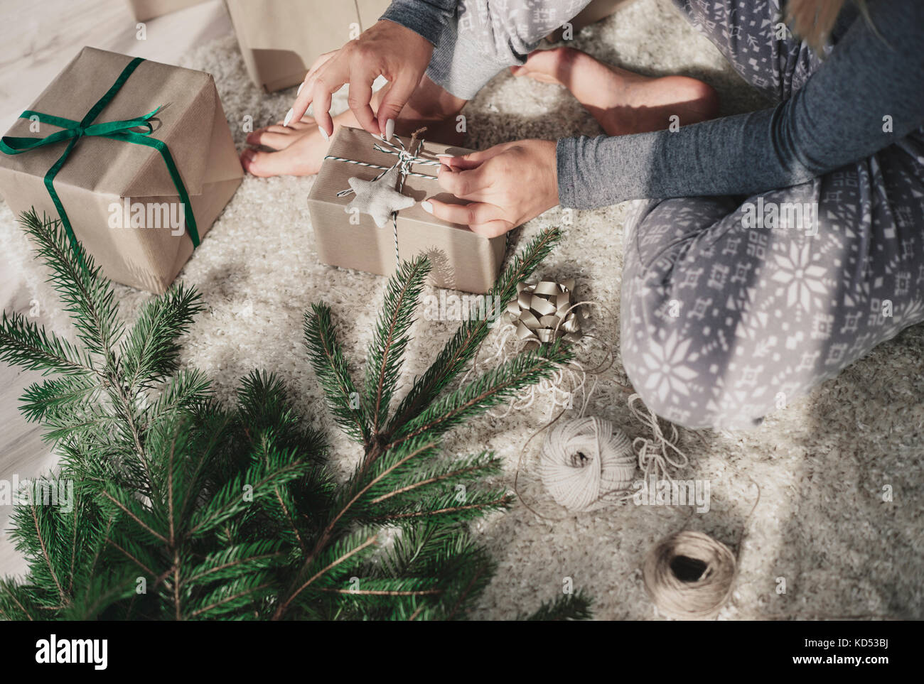 Person preparing presents christmas holiday hi-res stock photography ...