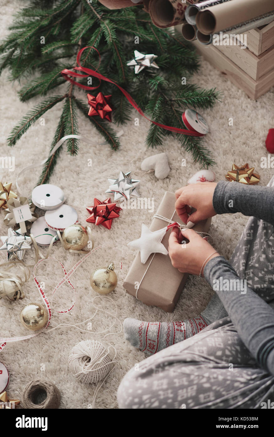Woman preparing paper wrapping christmas hi-res stock photography and ...