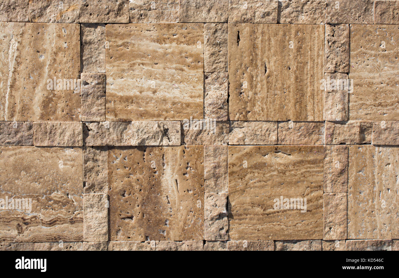 Decorative cubic stone wall as background texture Stock Photo - Alamy