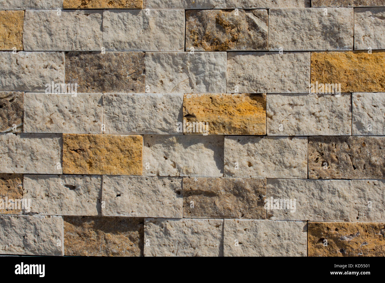 Decorative cubic stone wall as background texture Stock Photo - Alamy