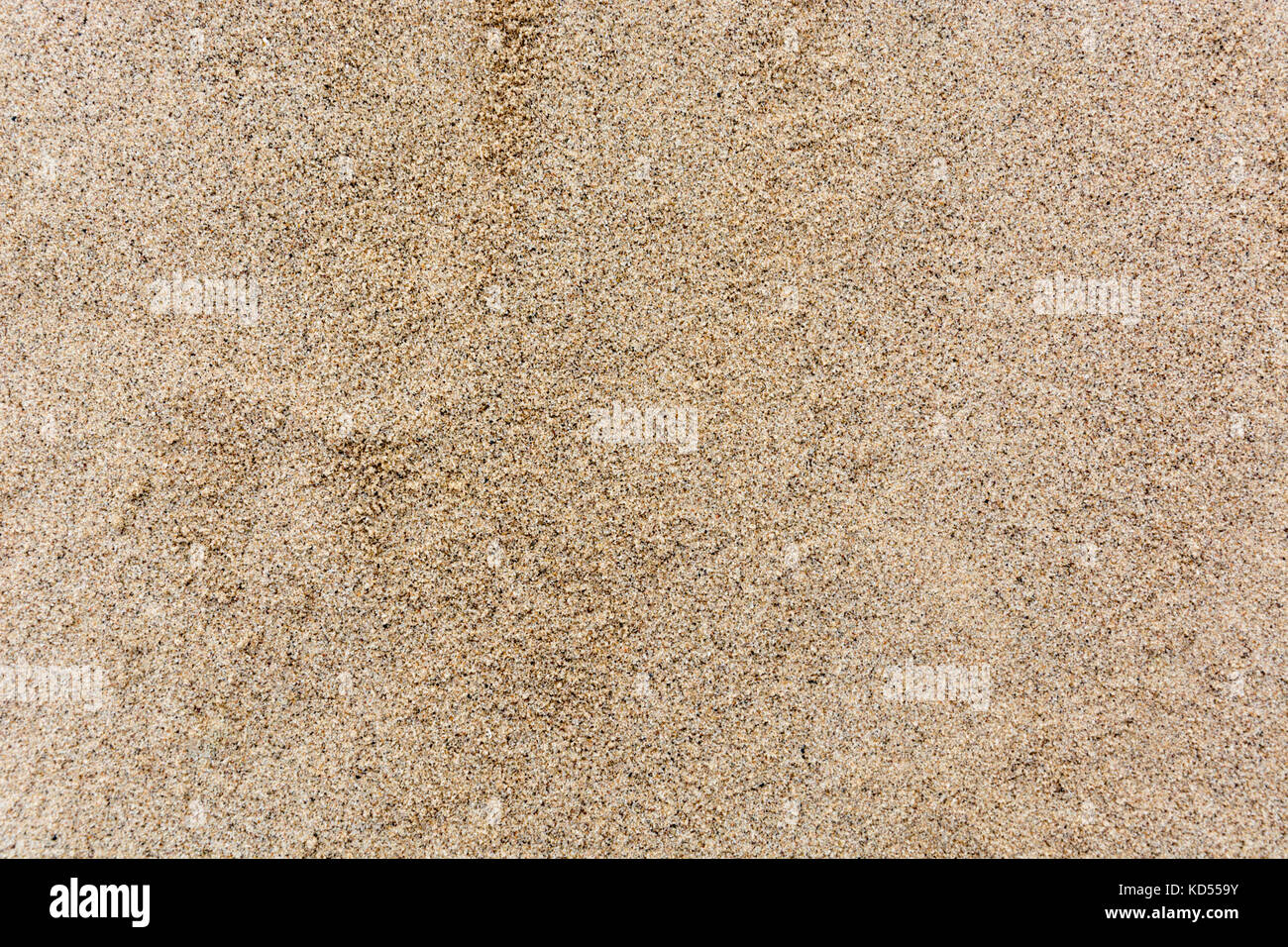 Sand as a background texture as seen from above Stock Photo - Alamy