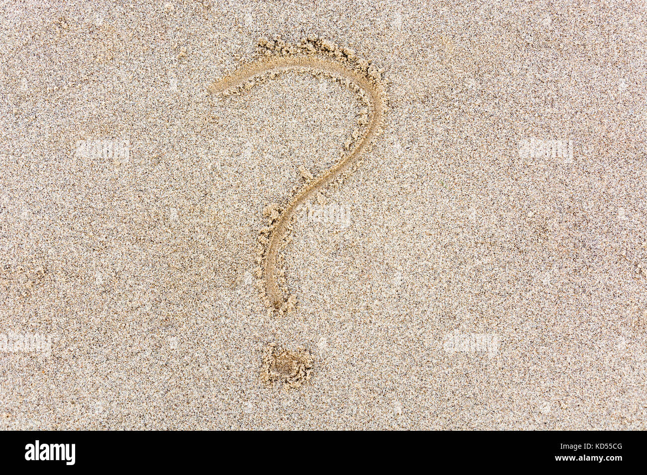 A question mark drawn in the sand from above Stock Photo - Alamy