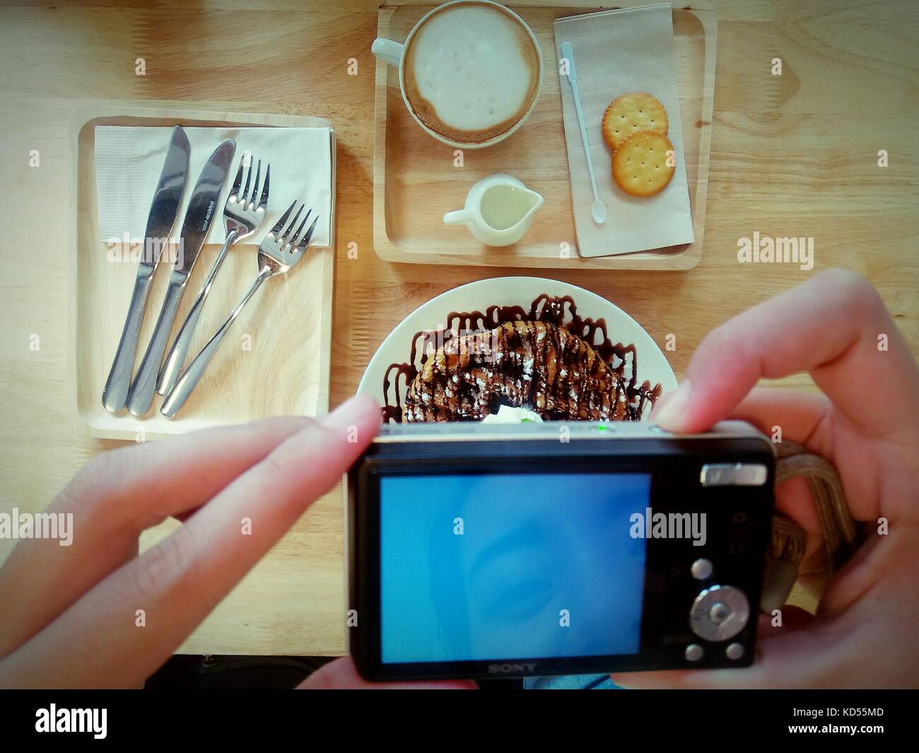 Taking pictures of food using a digital camera Stock Photo - Alamy