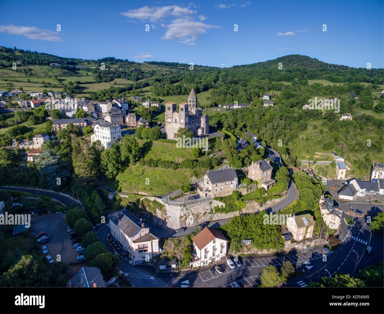 Saint-Nectaire (central France): aerial view of the village and its Romanesque church, in the ...