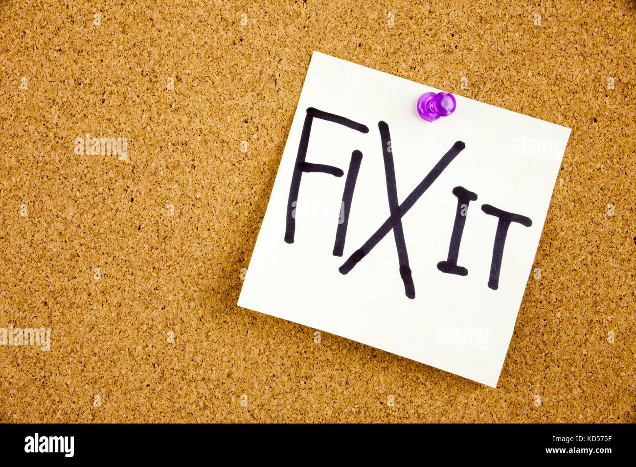 A yellow sticky note writing, caption, inscription Phrase FIX IT in ...