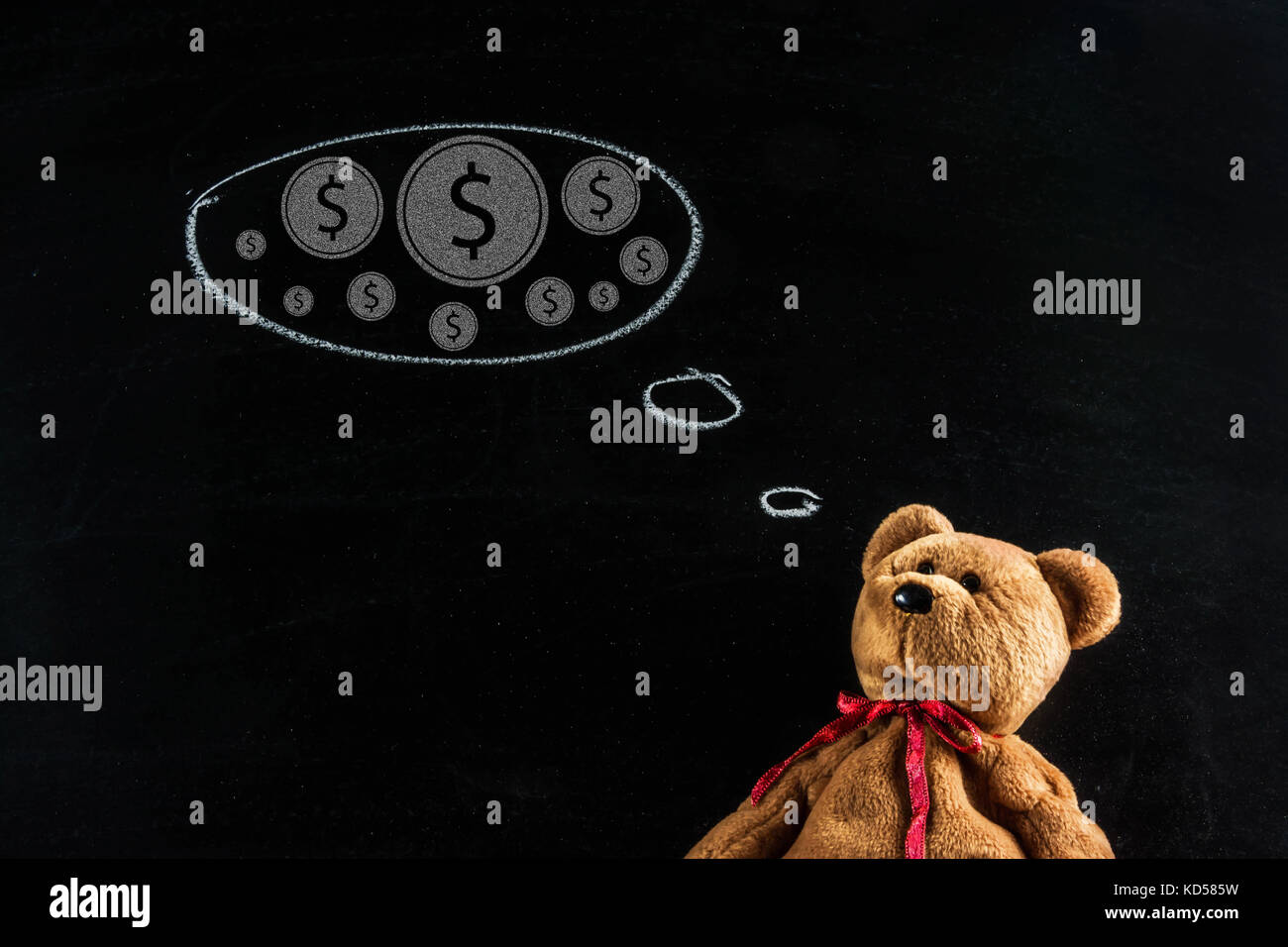 The dream of a teddy bear . Teddy bear with money icon Stock Photo - Alamy