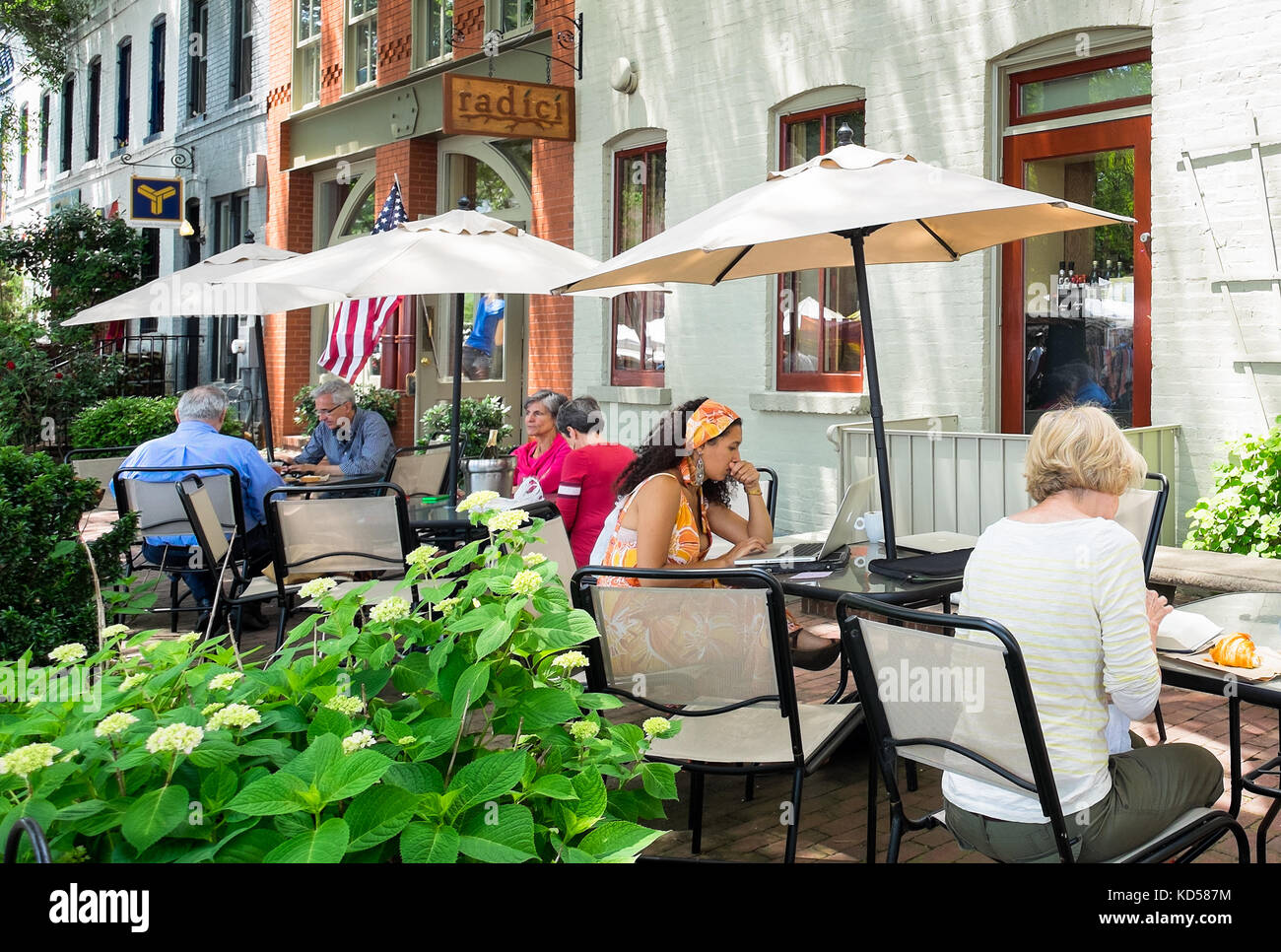 WASHINGTON DC - MAY 24, 2015: People at outdoor sidewalk cafes in the ...