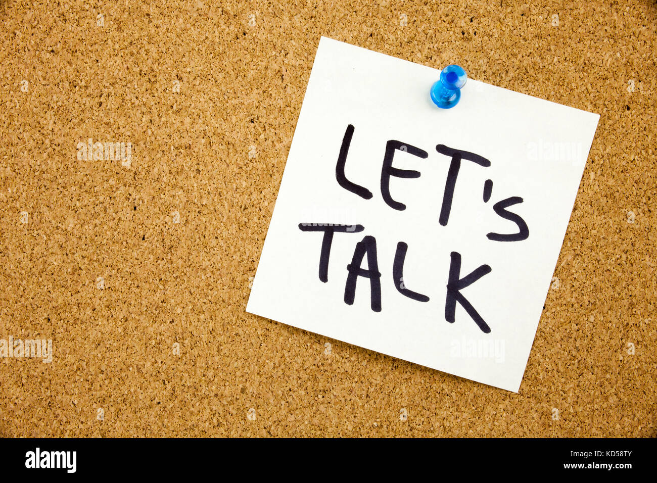 A yellow sticky note writing, caption, inscription Phrase LET'S TALK in ...