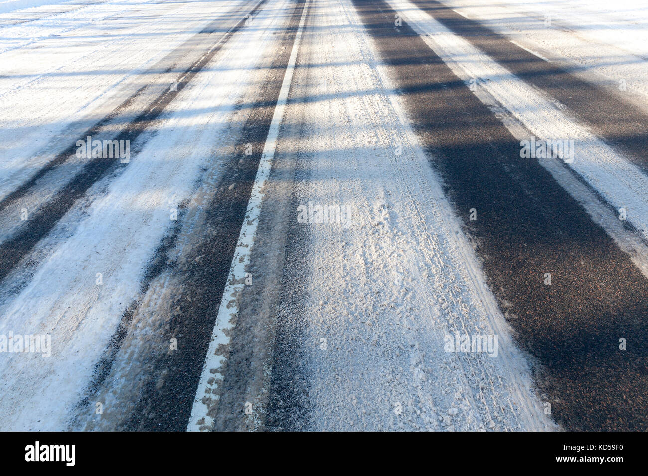 Road covered with snow Stock Photo - Alamy