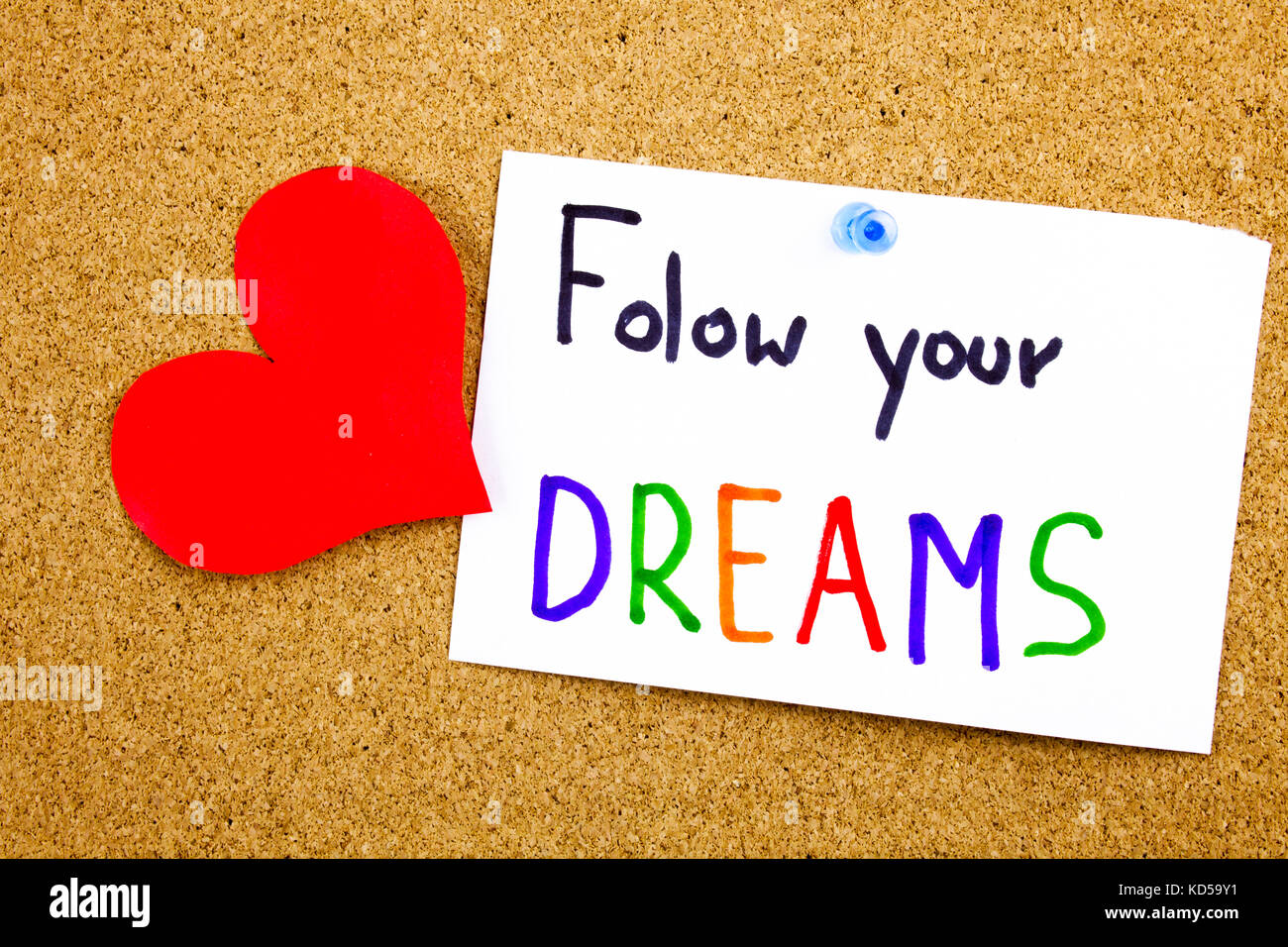 A yellow sticky note writing, caption, inscription Phrase FOLLOW YOUR ...