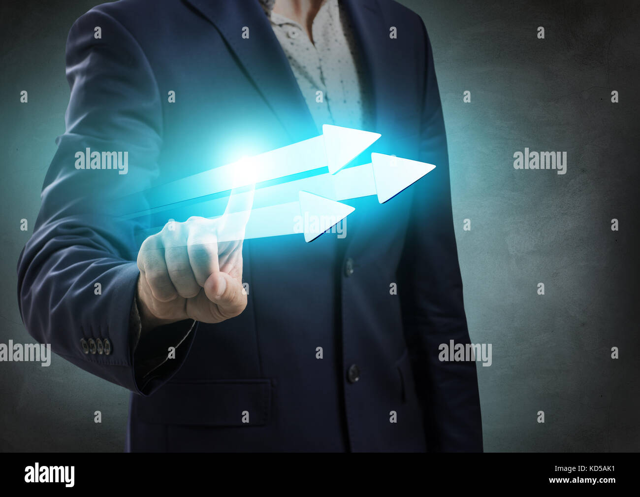 Businessman presents three purposeful arrows Stock Photo - Alamy