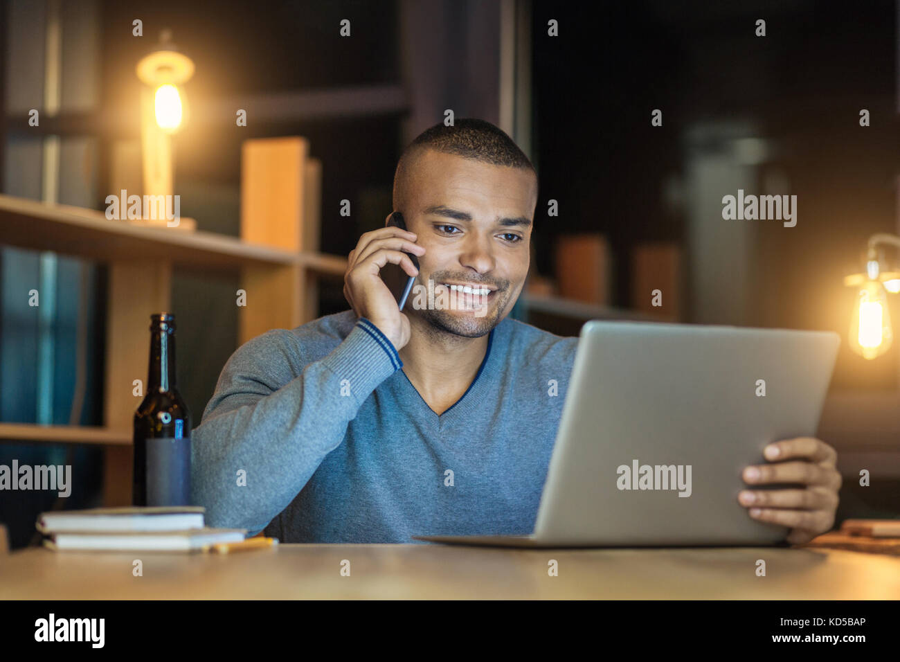 Attentive man having positive talk Stock Photo - Alamy