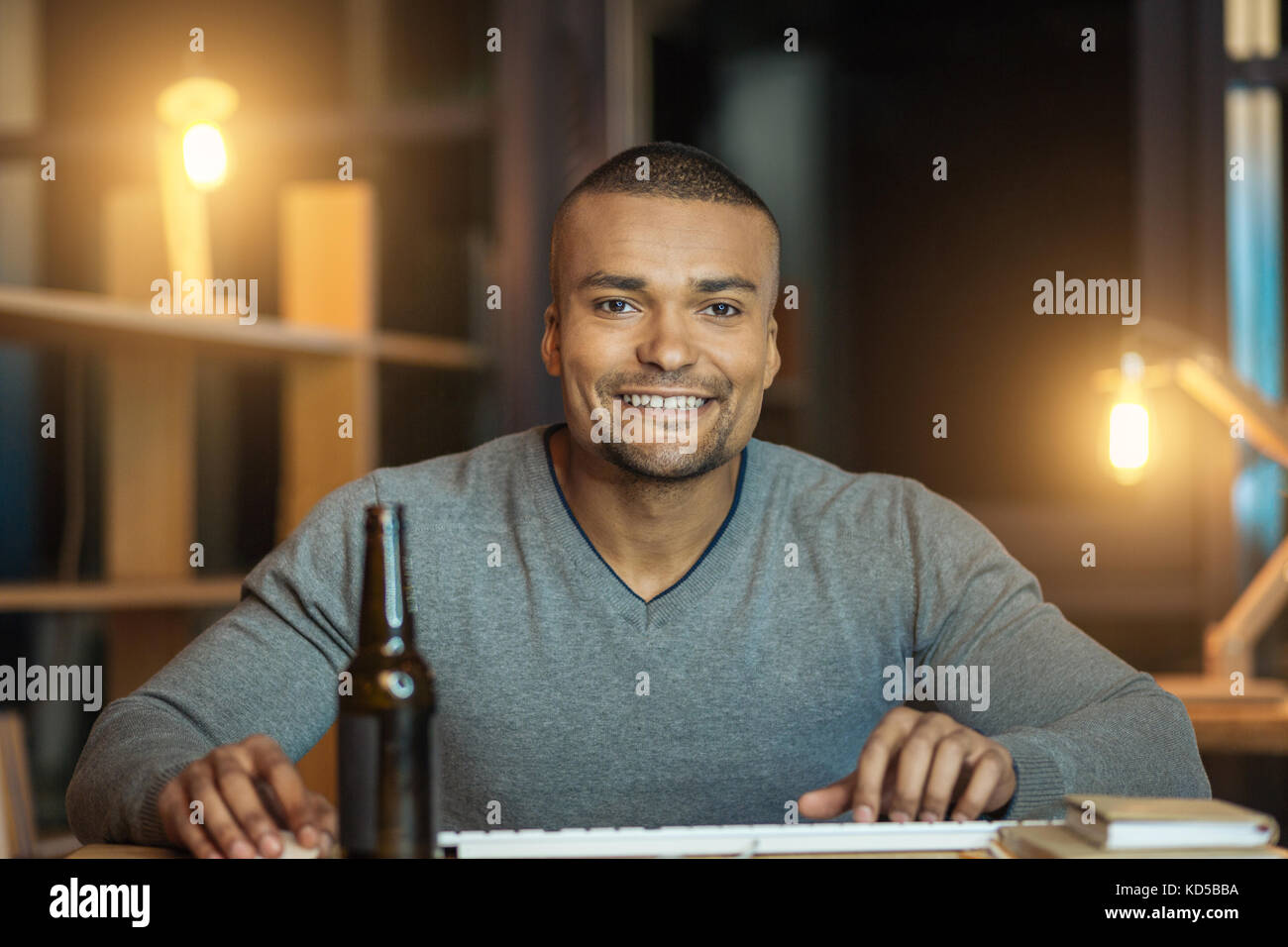 Portrait of smiling male person that posing on camera Stock Photo - Alamy
