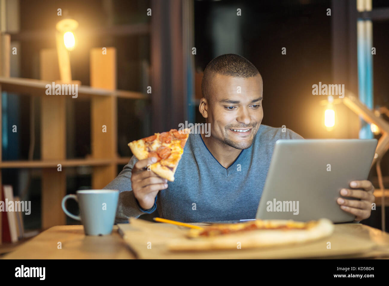 Concentrated man being very busy Stock Photo - Alamy