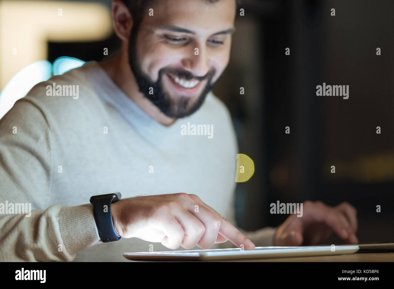 Cheerful young male person being at work Stock Photo - Alamy