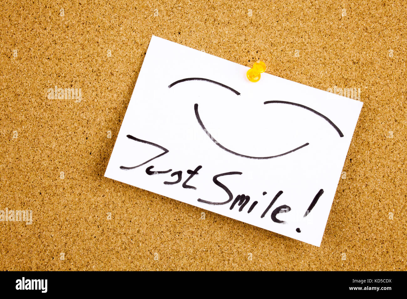A yellow sticky note writing, caption, inscription Top view of Just ...