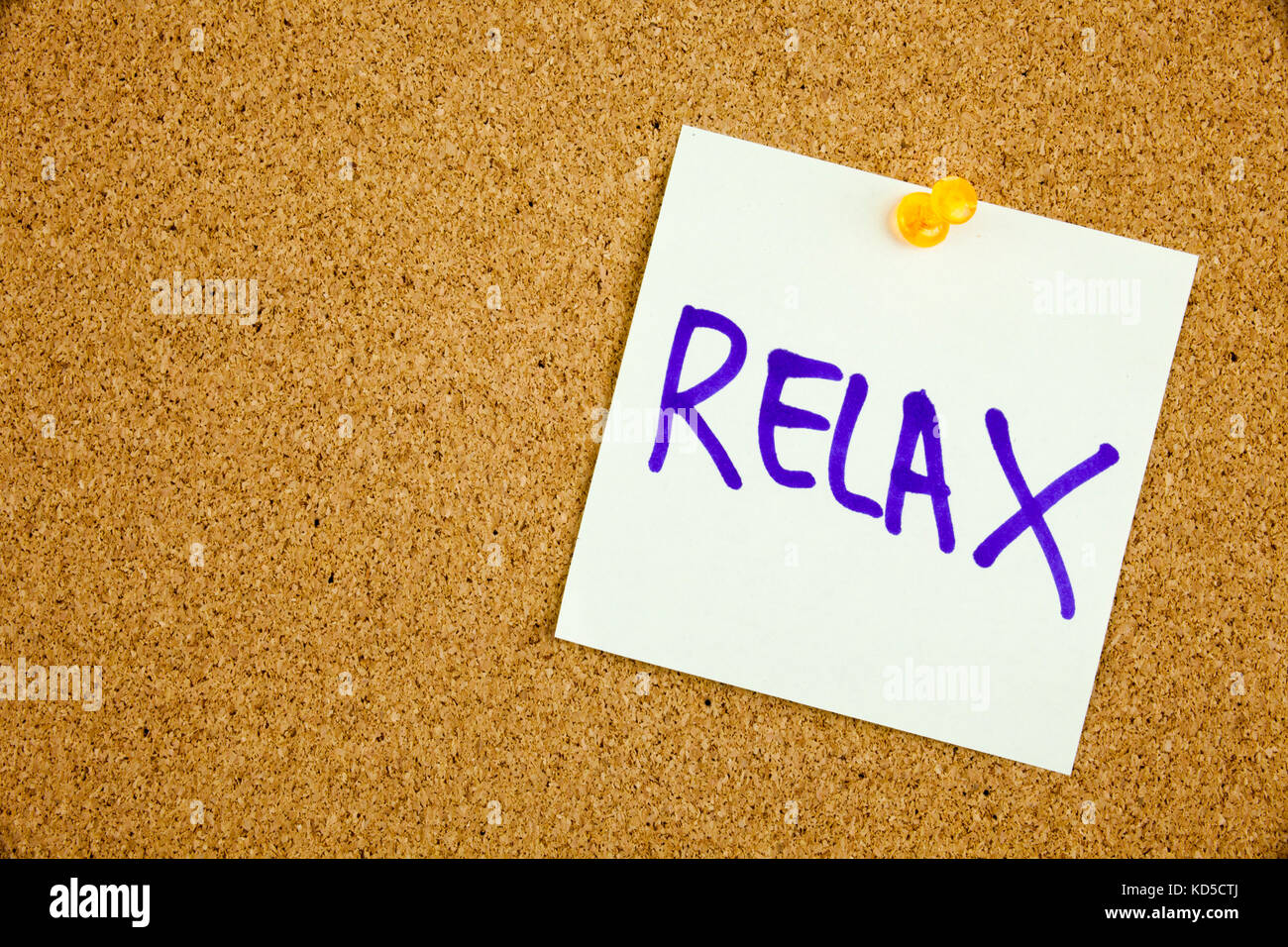 A yellow sticky note writing, caption, inscription Motivational concept ...