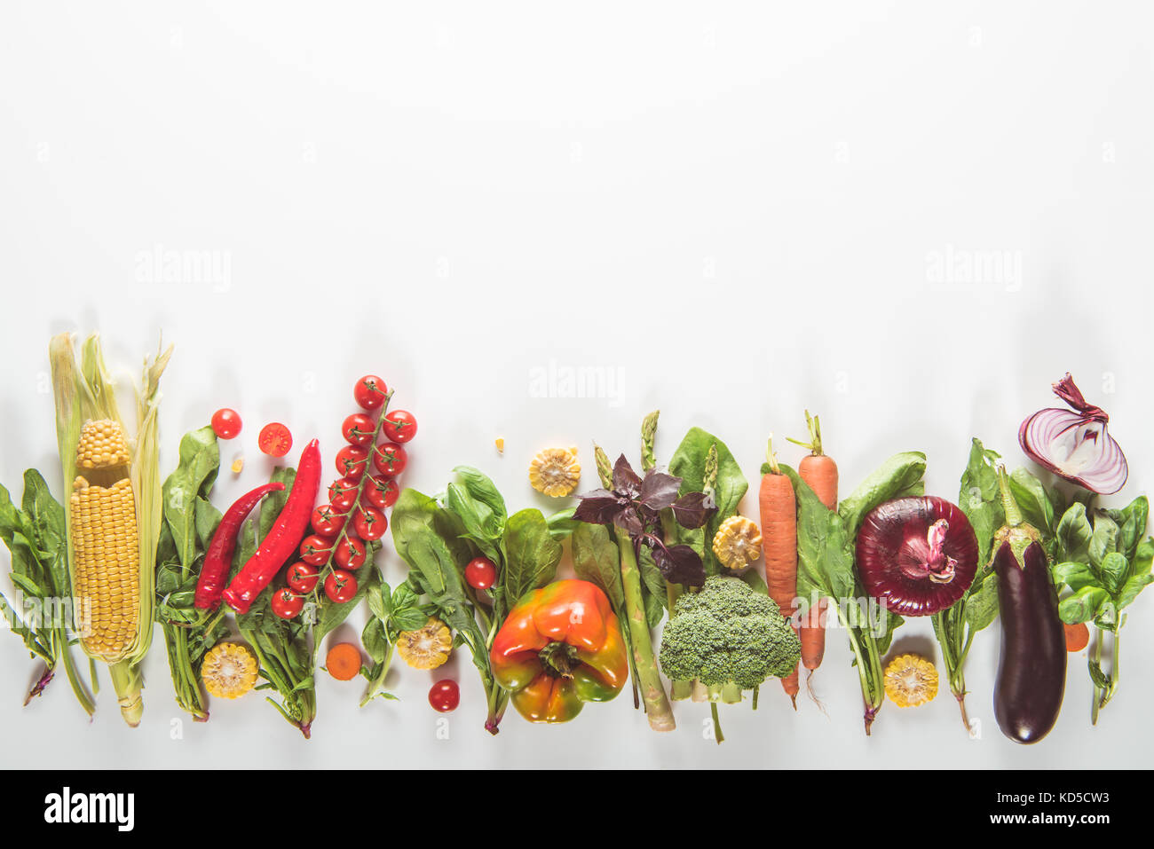 vegetables lying in row Stock Photo - Alamy