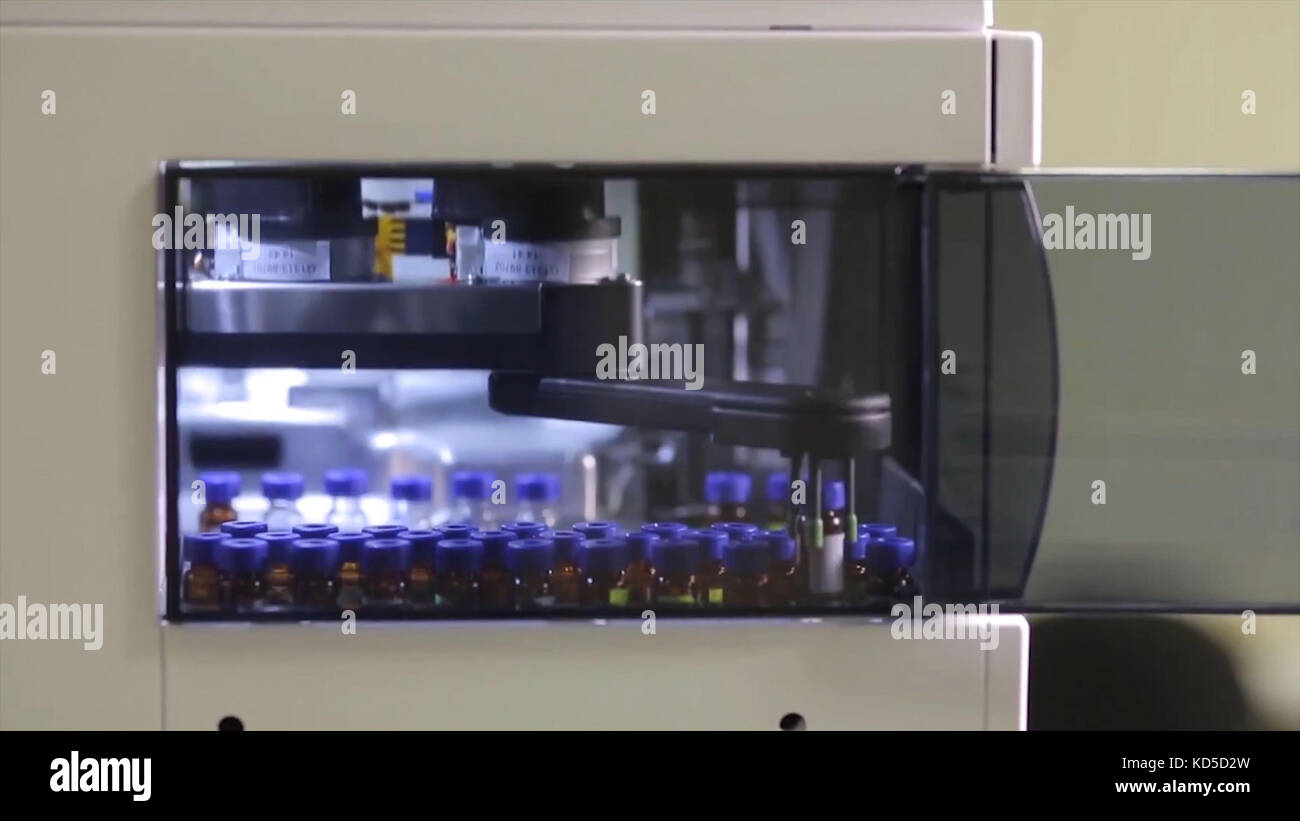 Laboratory automatic machine. Auto clips installed in her plastic tubes ...