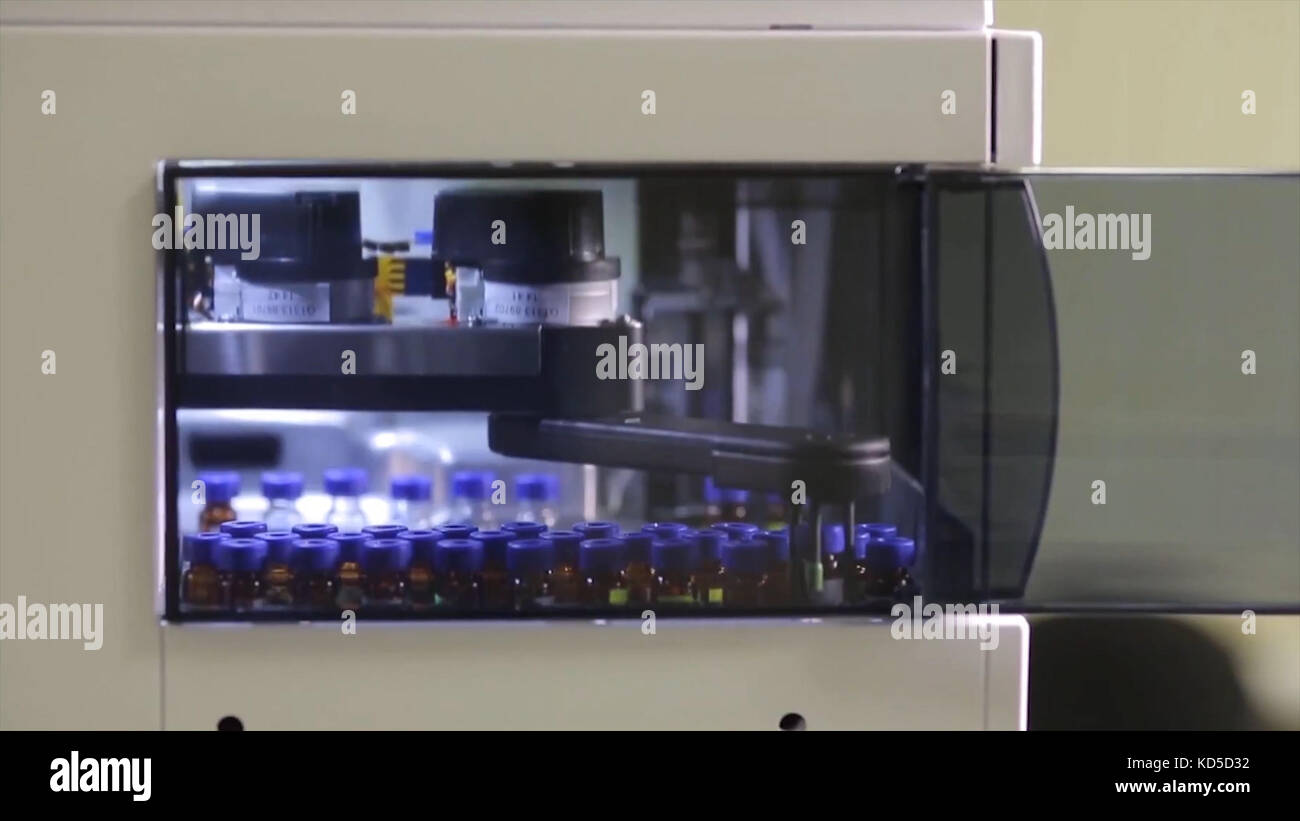 Laboratory automatic machine. Auto clips installed in her plastic tubes ...