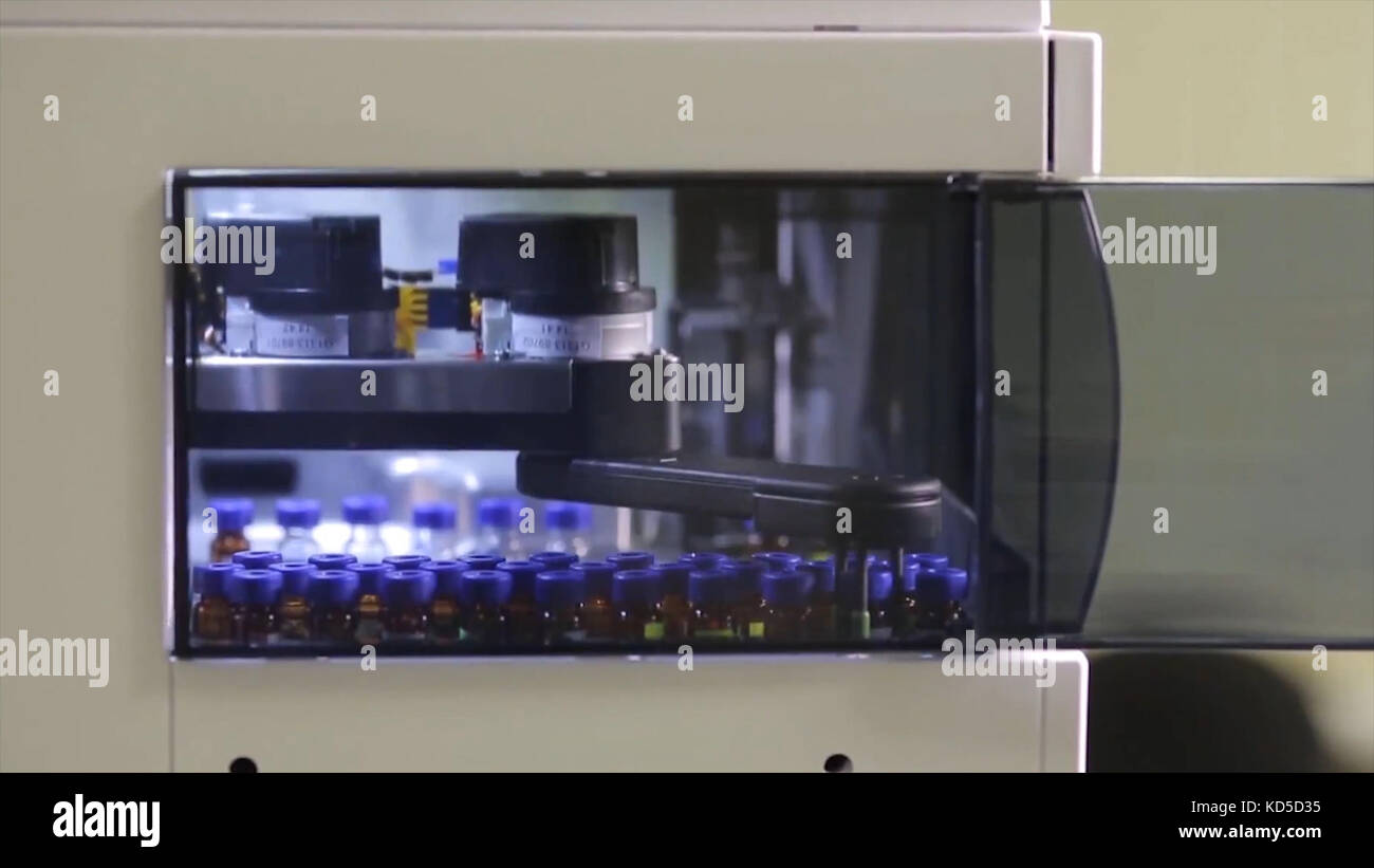 Laboratory automatic machine. Auto clips installed in her plastic tubes ...