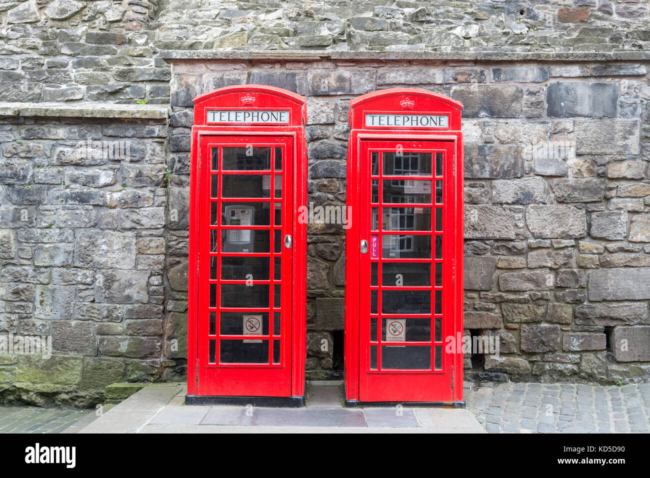 Two red british telephone boxes as seen from the front Stock Photo - Alamy