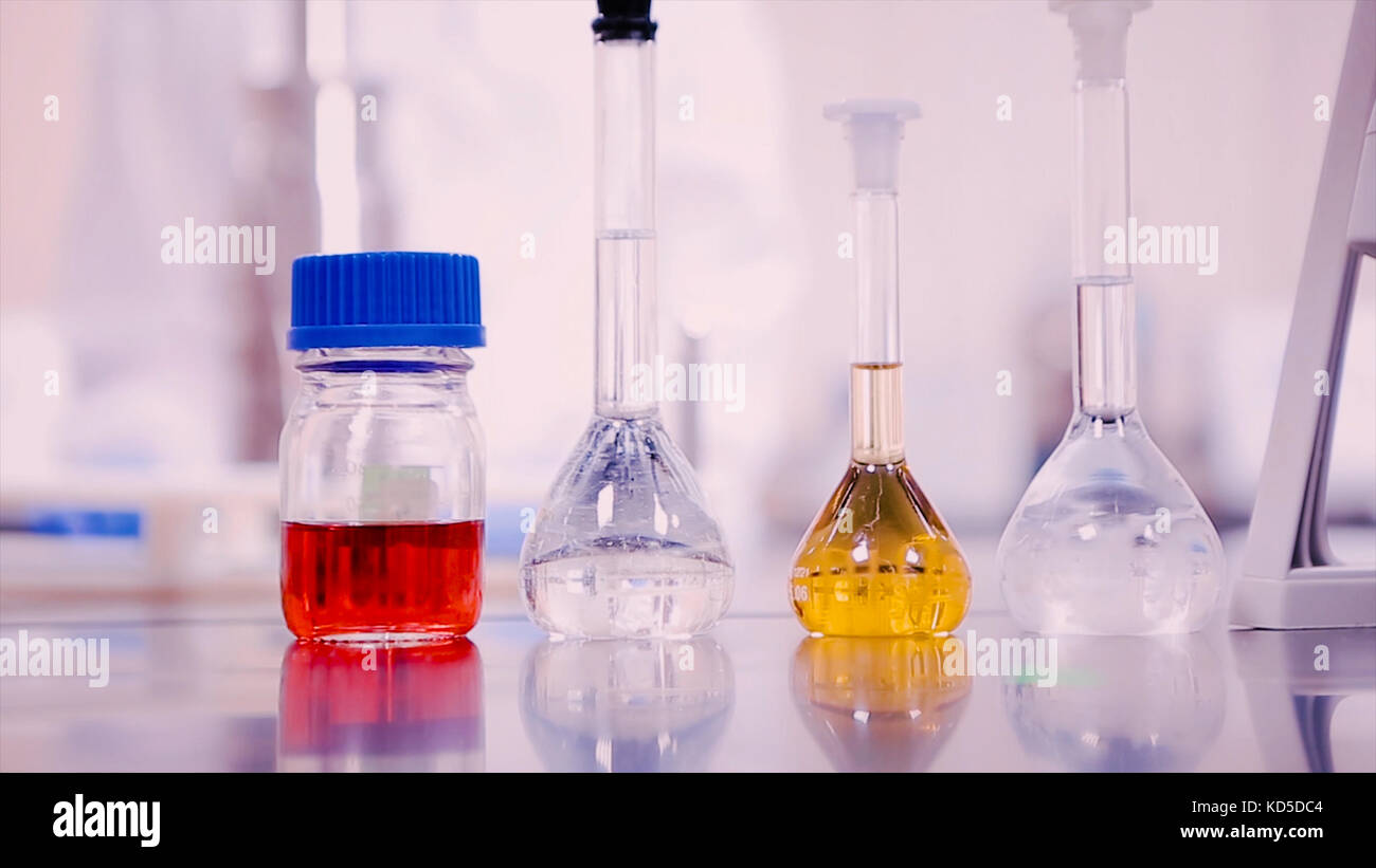 Laboratory Flasks And Beakers With Liquids Of Different Colors On Lab Table Stock Photo Alamy laboratory-flasks-and-beakers-with-liquids-of-different-colors-on-lab-table-stock-photo-alamy