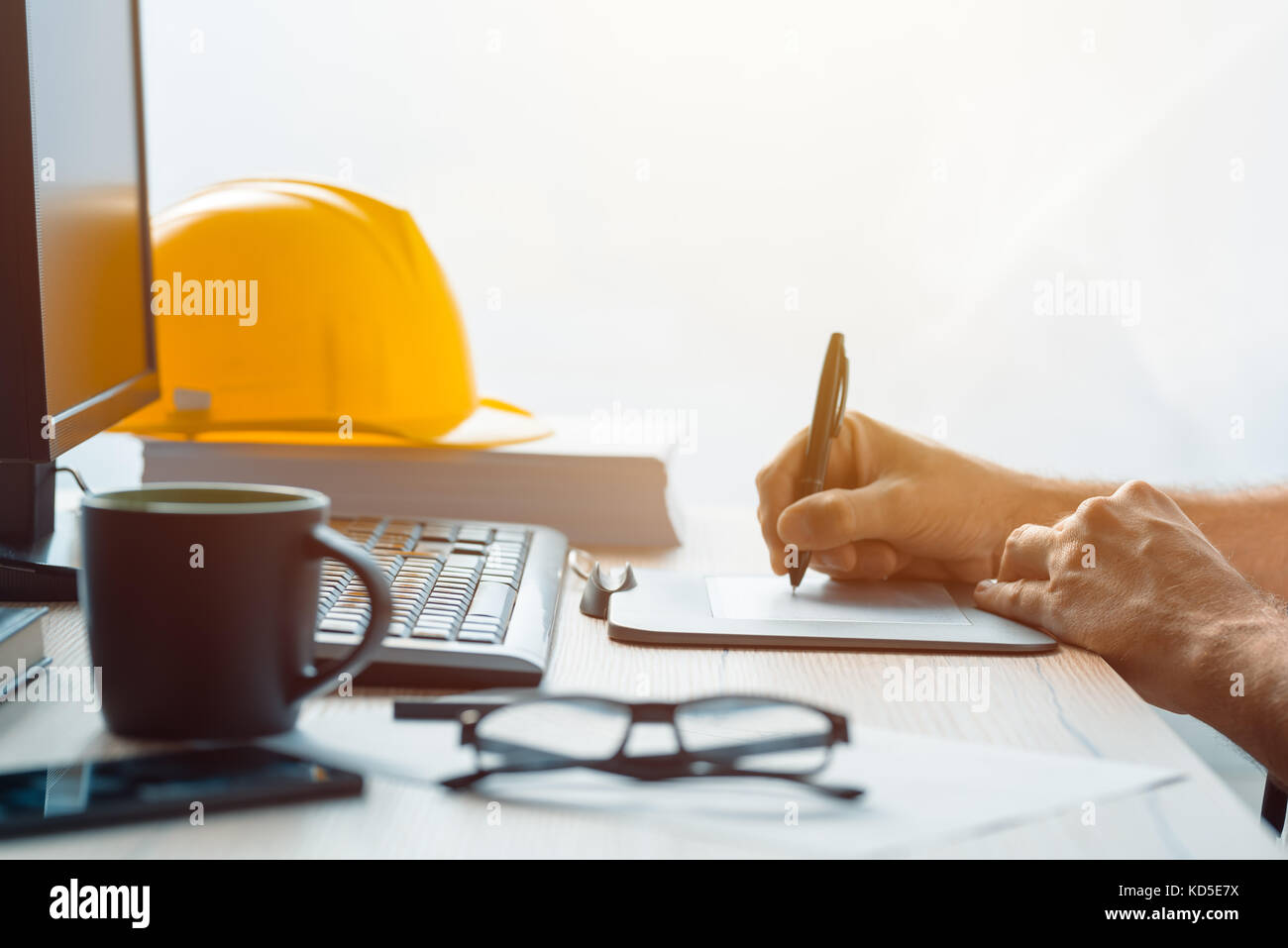 Architect construction engineer working with sketch pen tablet in ...