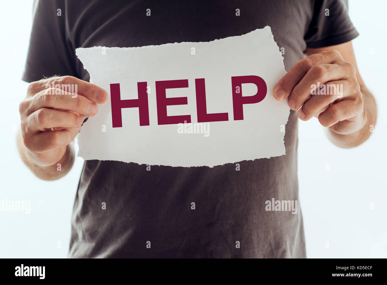 Man asking for help and support. Adult caucasian male holding paper ...