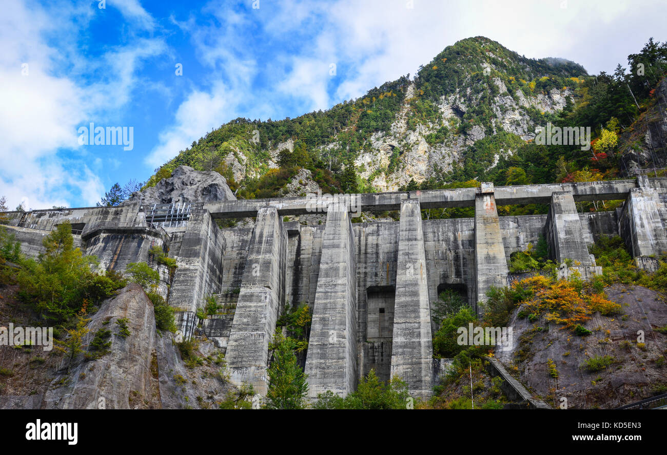 Kurobe Dam at autumn in Toyama, Japan. The Kurobe Dam is a 492 m long ...