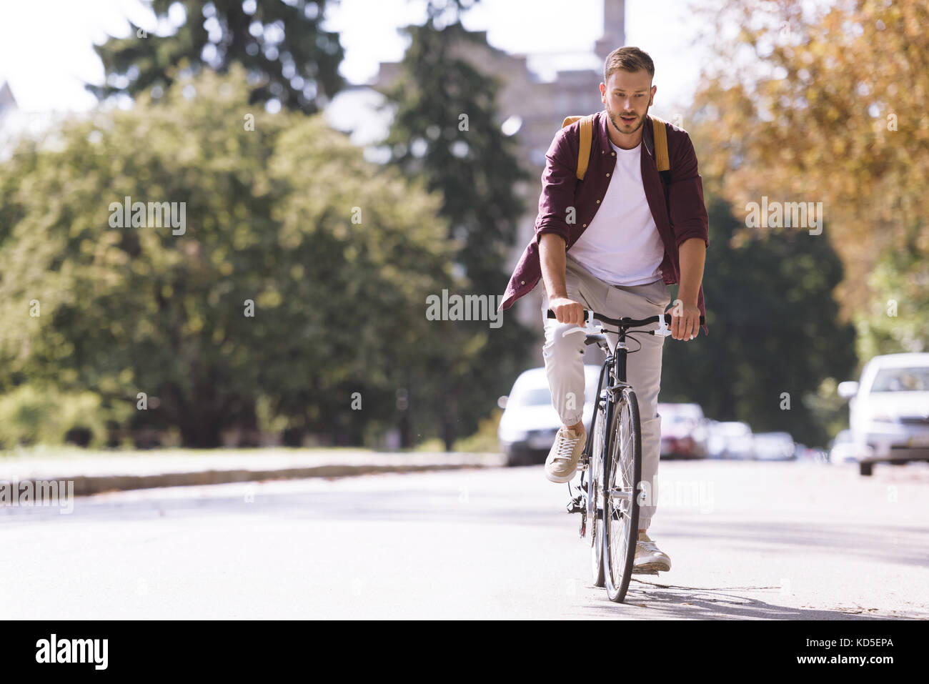 man riding bicycle Stock Photo - Alamy