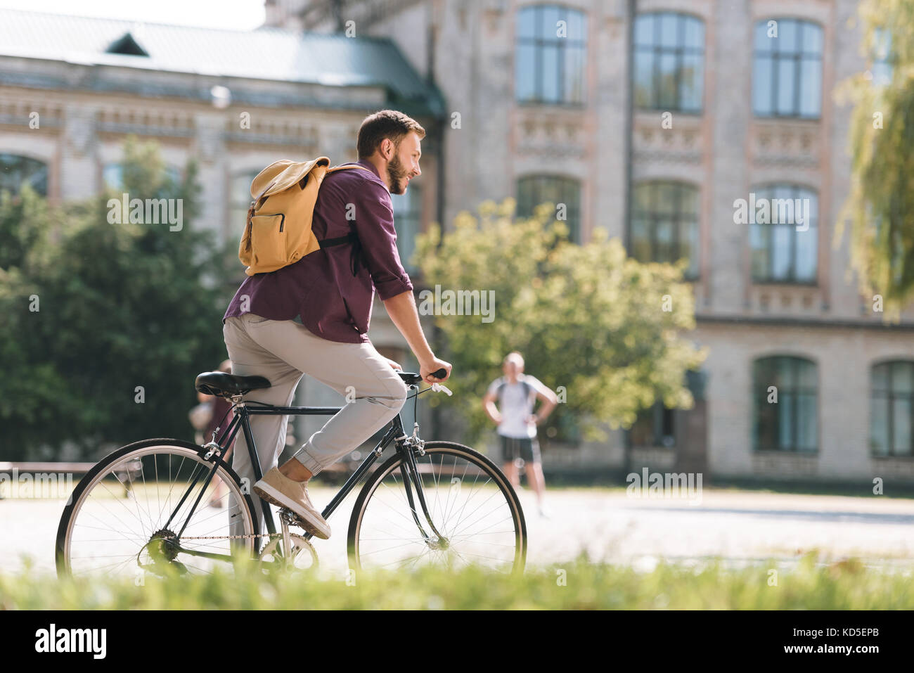 man riding bicycle Stock Photo - Alamy