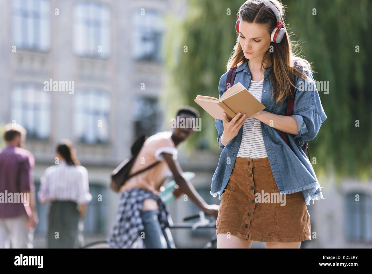 attractive student reading book Stock Photo - Alamy