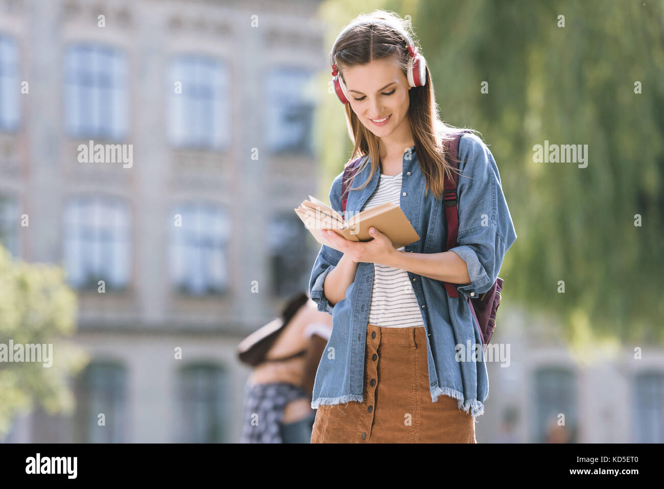 attractive student reading book Stock Photo - Alamy