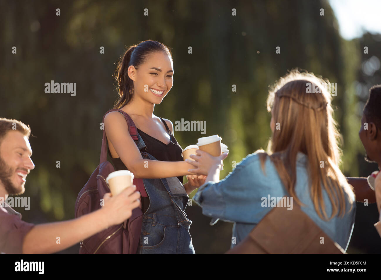 Young woman spending time park friends hi-res stock photography and ...