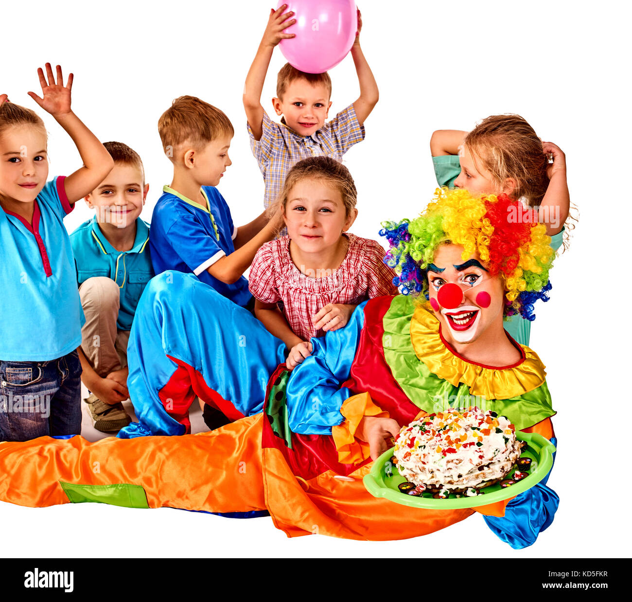 Birthday child clown playing with children. Kid holiday cakes ...