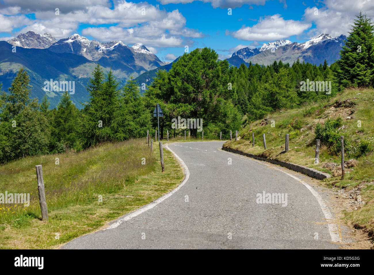 Mortirolo pass road with mountain peaks Stock Photo - Alamy