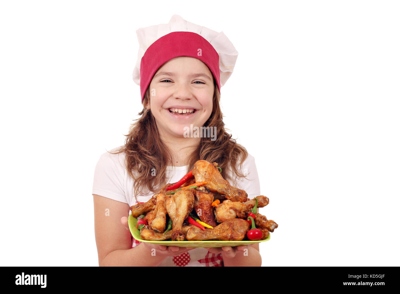 happy little girl cook with chicken drumstick Stock Photo - Alamy