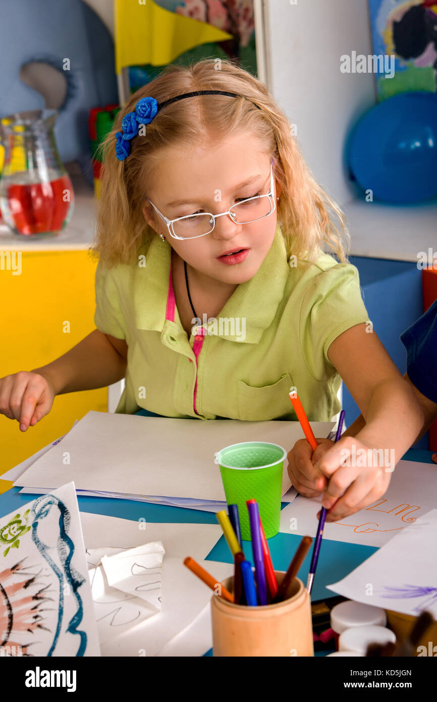 Small students children painting in art school class Stock Photo - Alamy