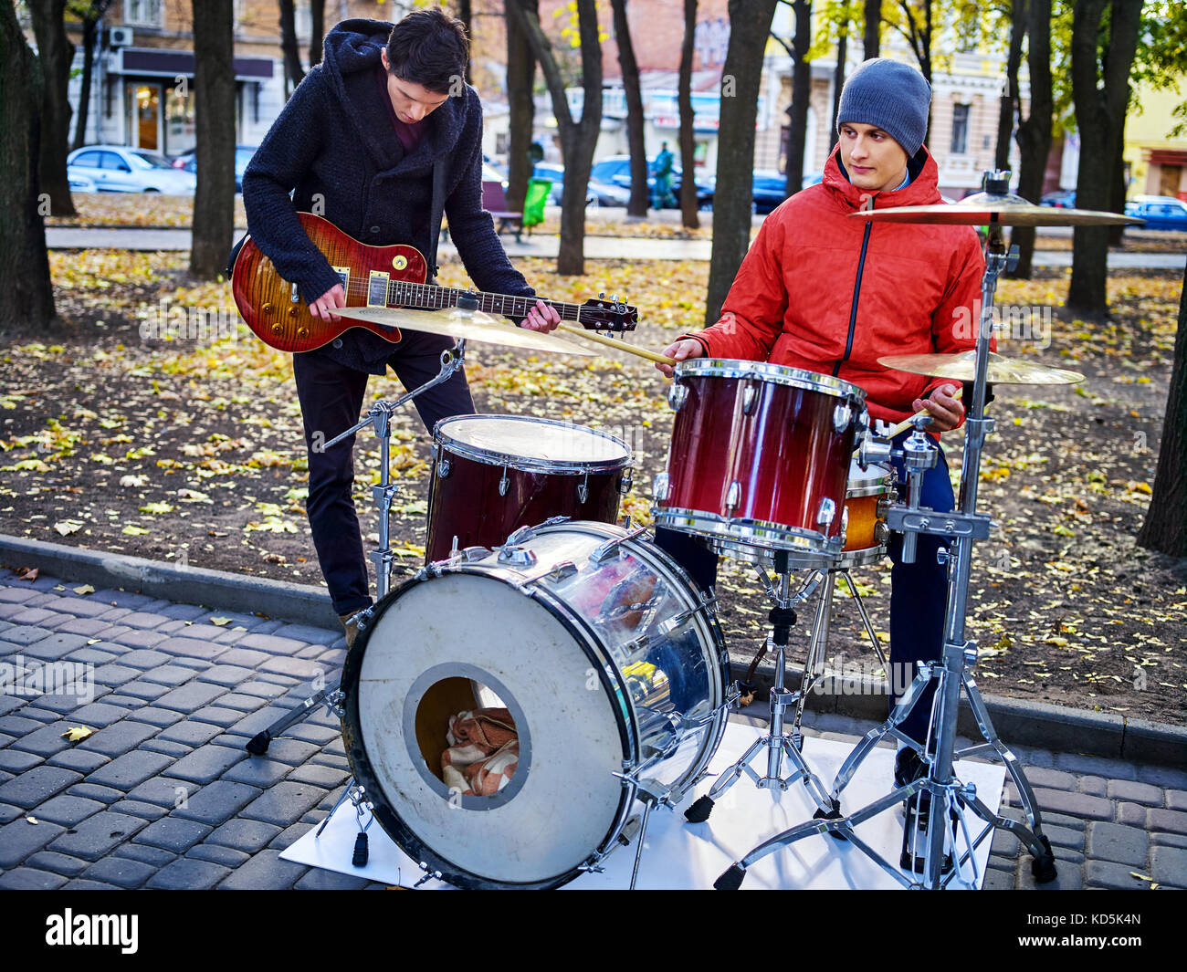 Festival music band. Friends playing on percussion instruments city ...
