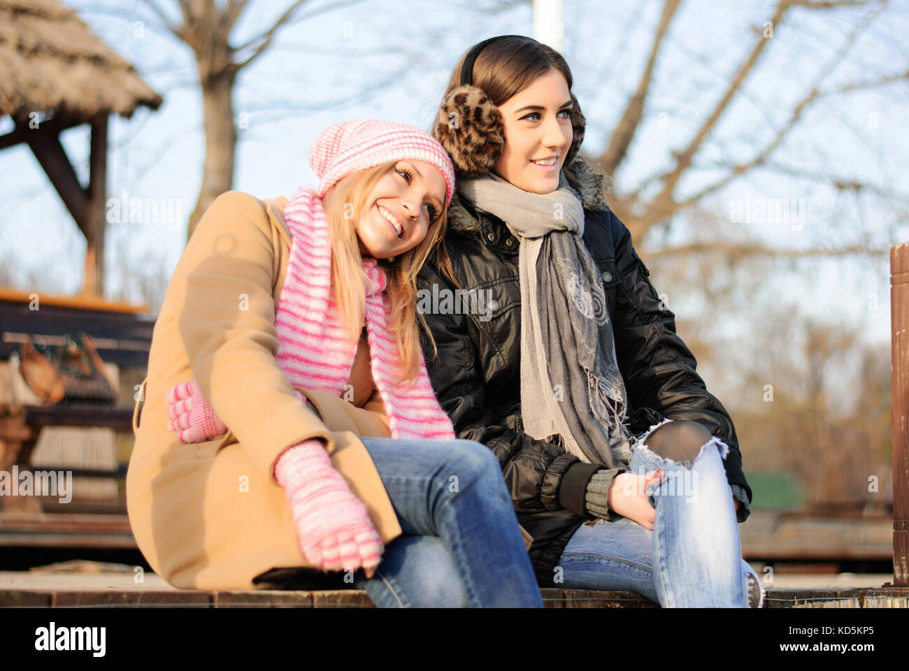 Two girls spending time outdoors Stock Photo - Alamy