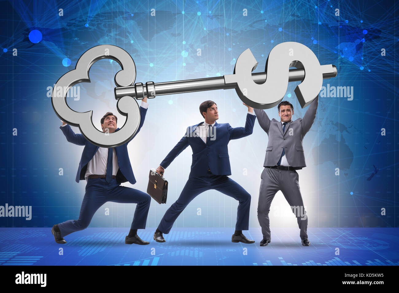 Businessmen holding giant key in finance concept Stock Photo - Alamy