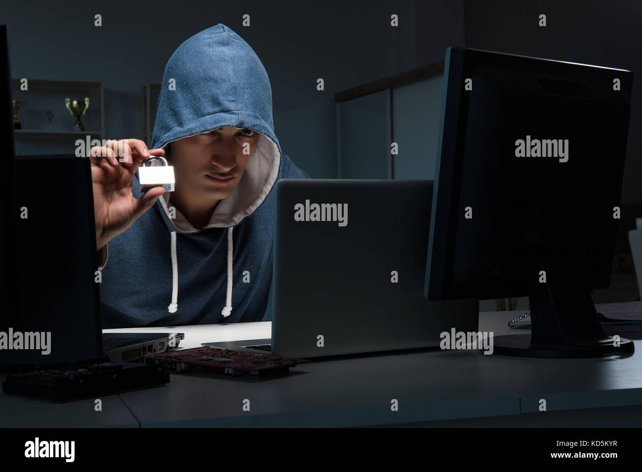 Hacker hacking computer at night Stock Photo - Alamy