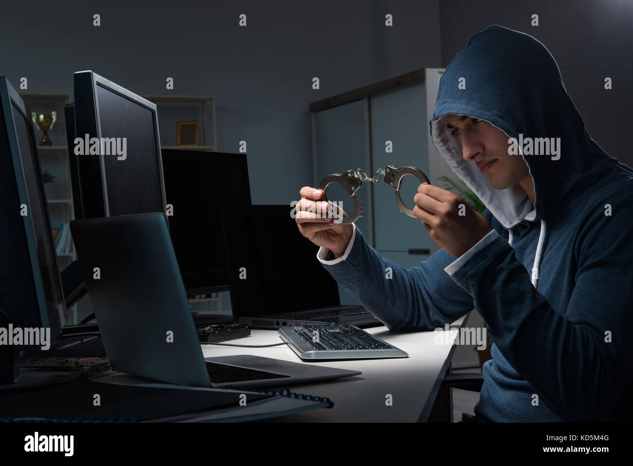 Hacker hacking computer at night Stock Photo - Alamy