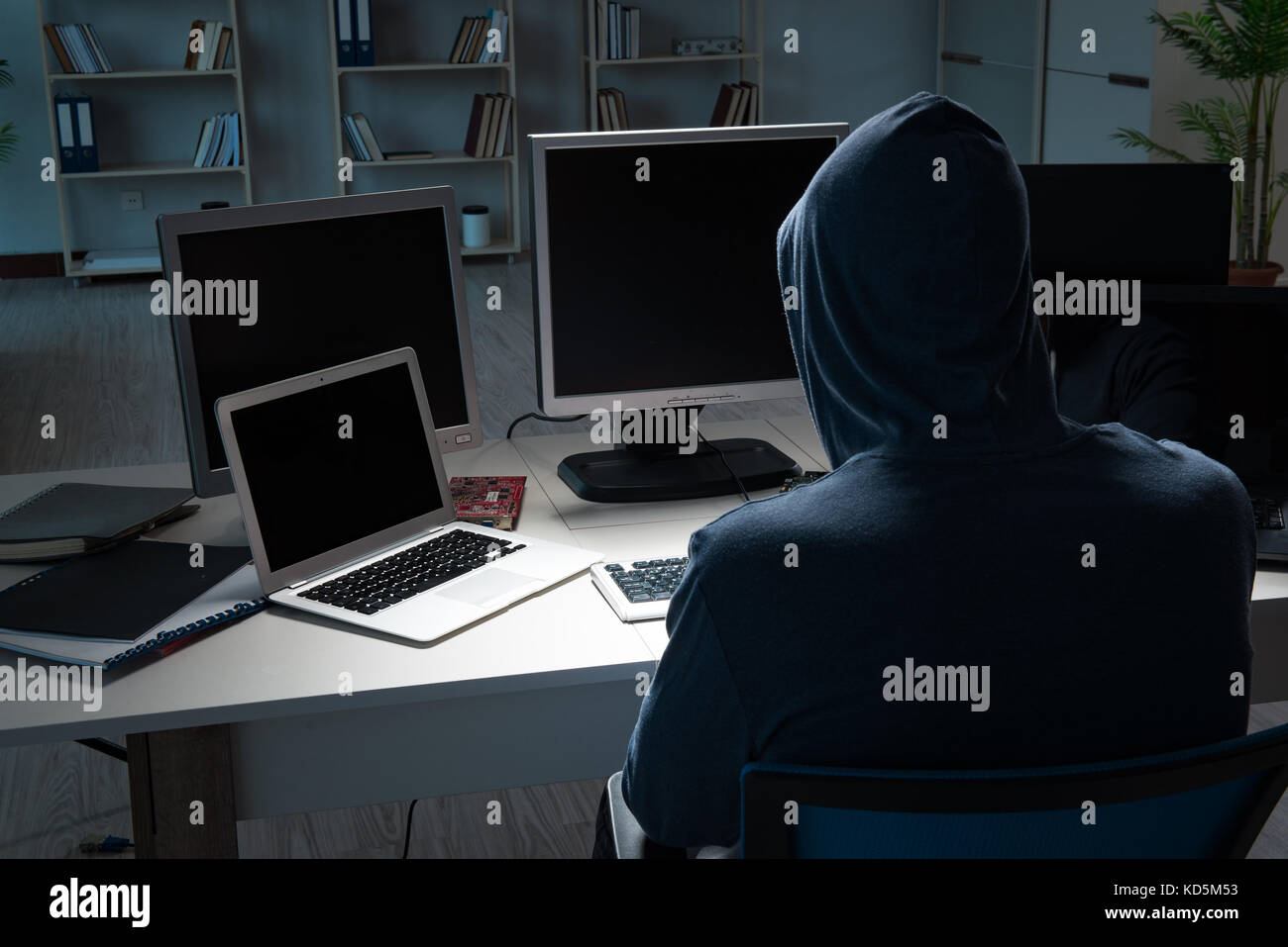 Hacker hacking computer at night Stock Photo - Alamy