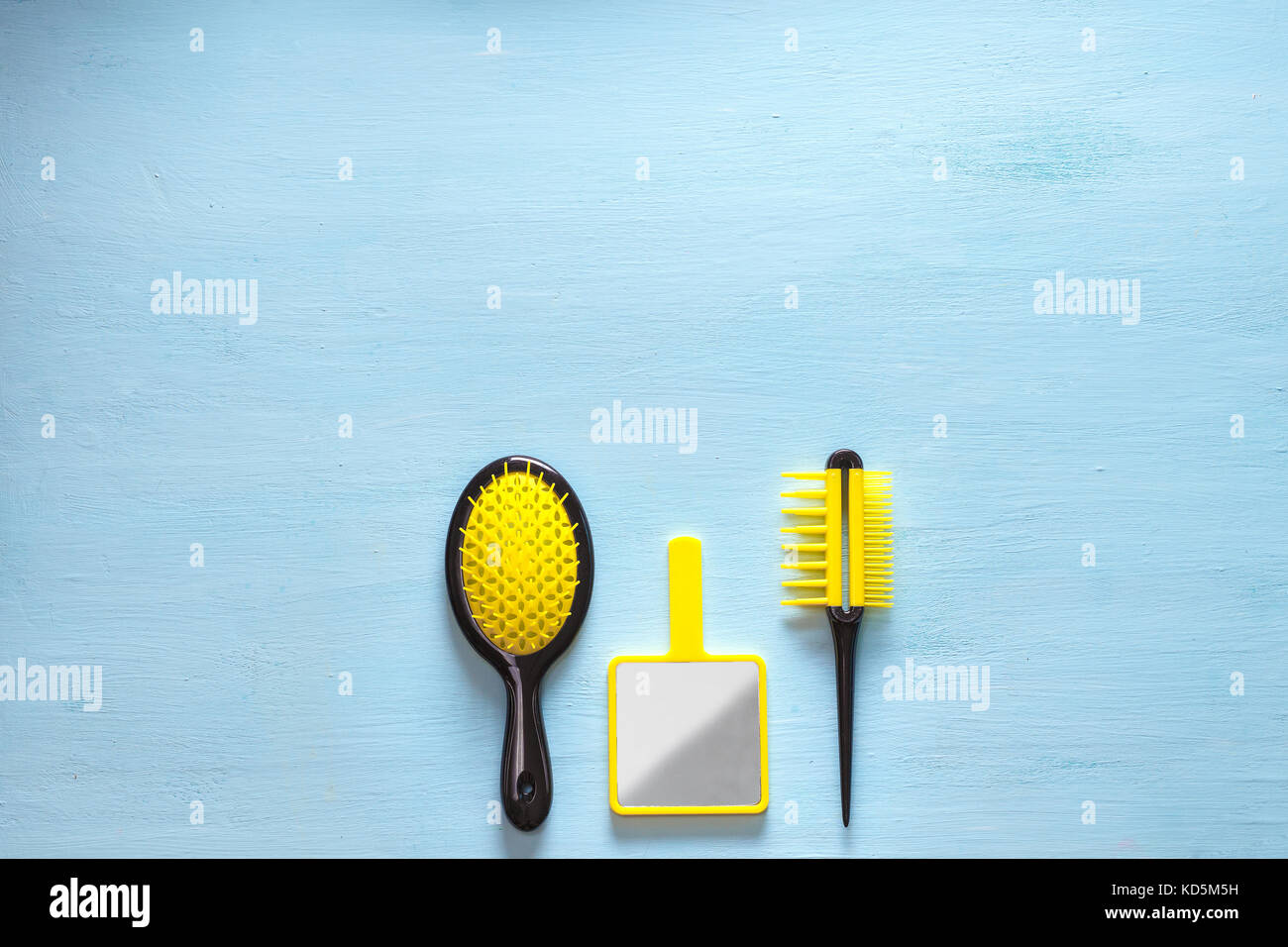 Two yellow hair comb crest brushes with handle for all types, and ...