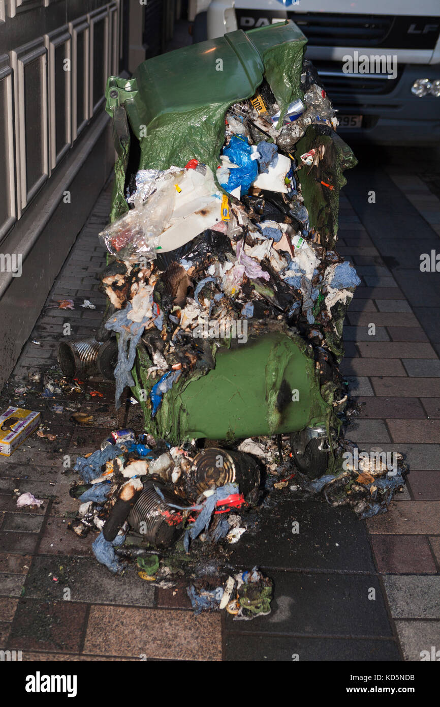 Belfast, Fountain Lane, 9th October 2017. Remnants of a large dustbin ...