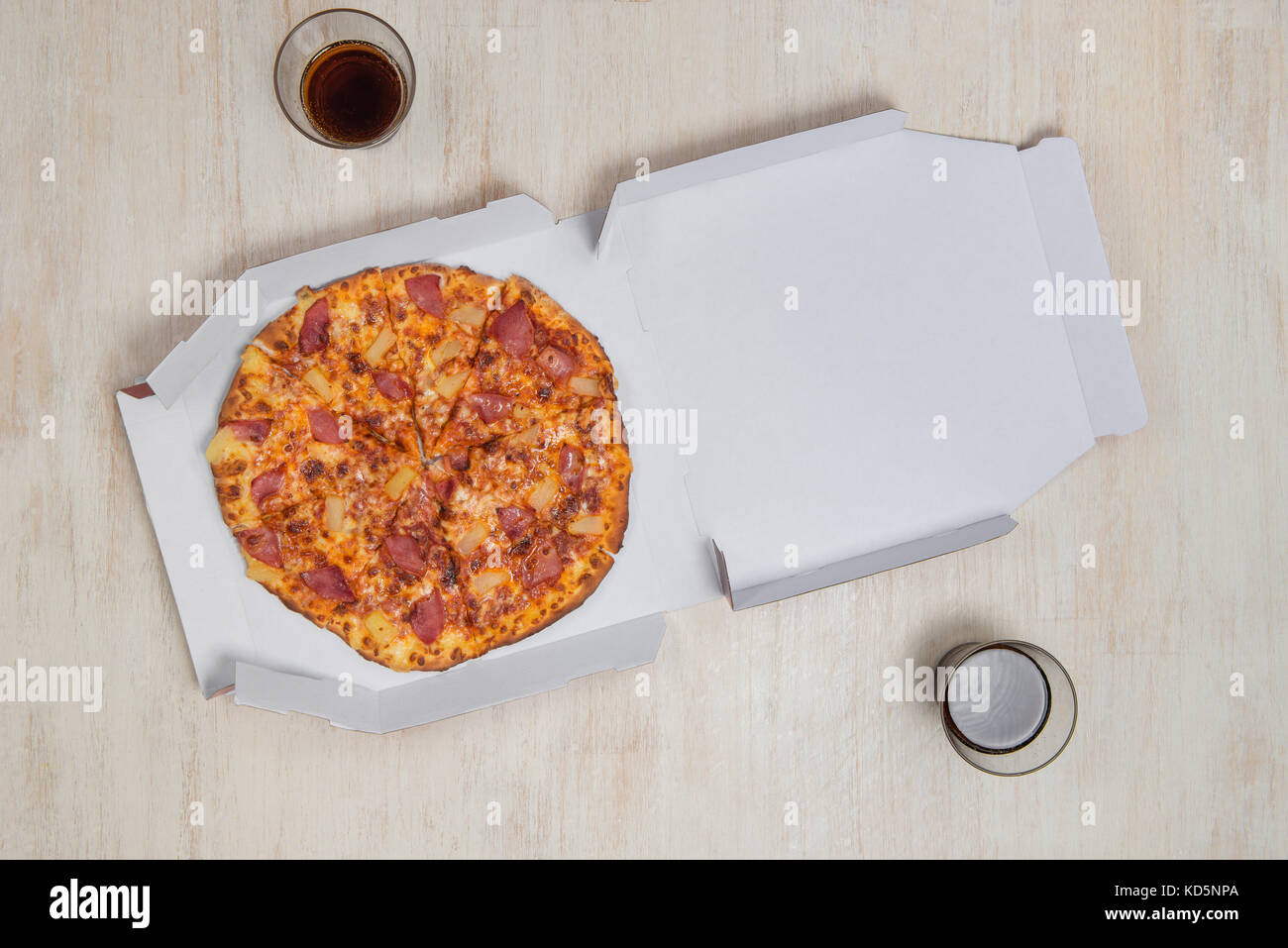 Pizza in a cardboard box. Space for text. View from above. Pizza ...